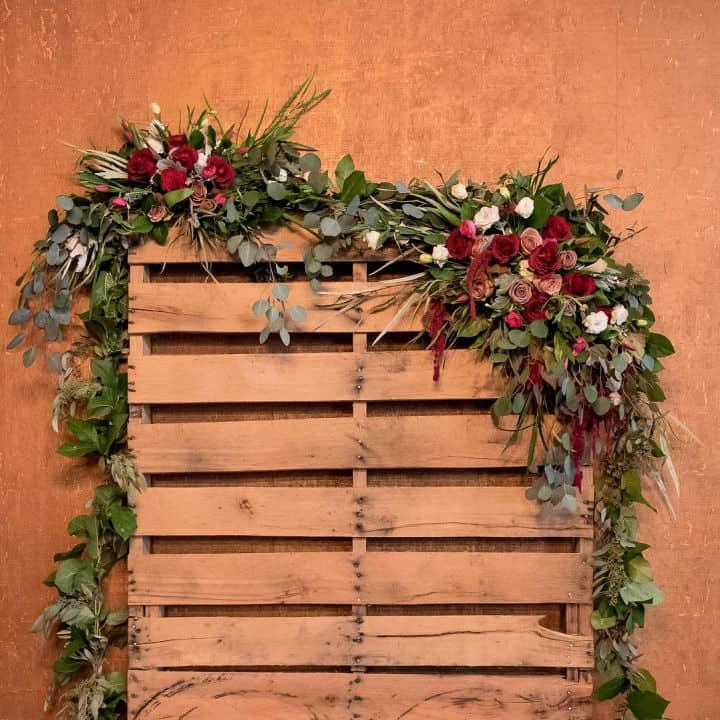 25 Wood Pallet Backdrop Ideas To Get Rustic Appeal - Solar Living Savvy